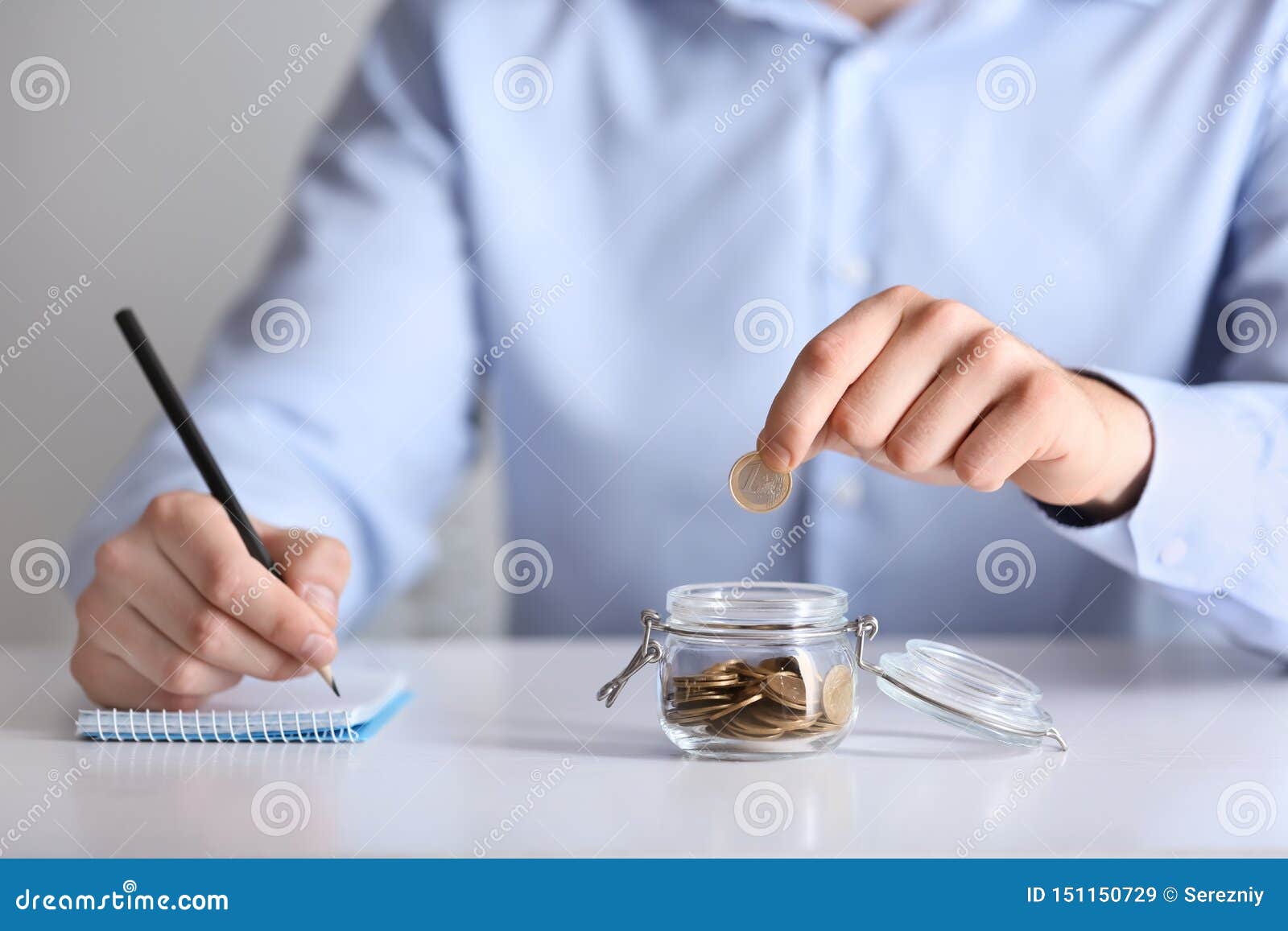 Man Counting Coins at Table. Savings Concept Stock Image - Image of ...
