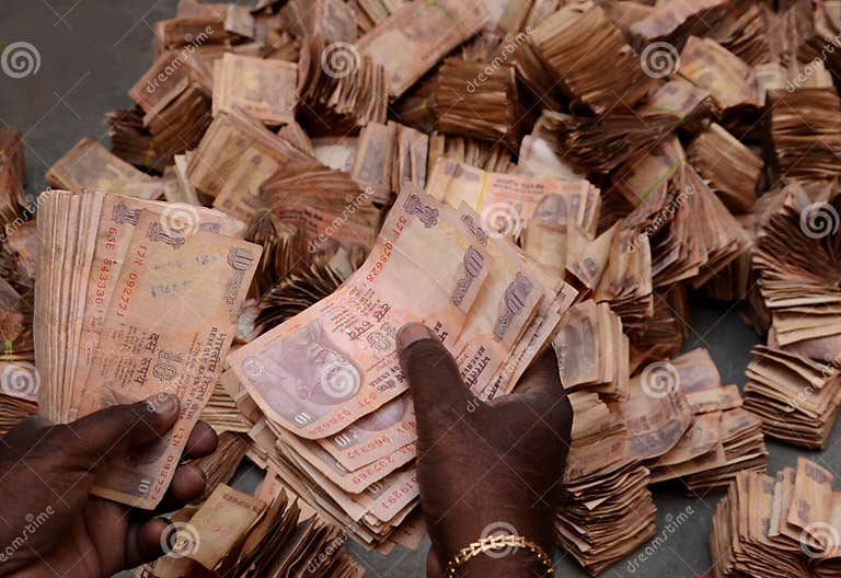 Man counting indian rupees stock image. Image of denominations - 35068327