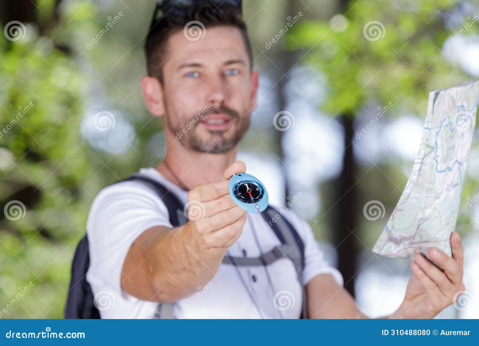 Man in Countryside with Map Showing Compass Stock Photo - Image of ...