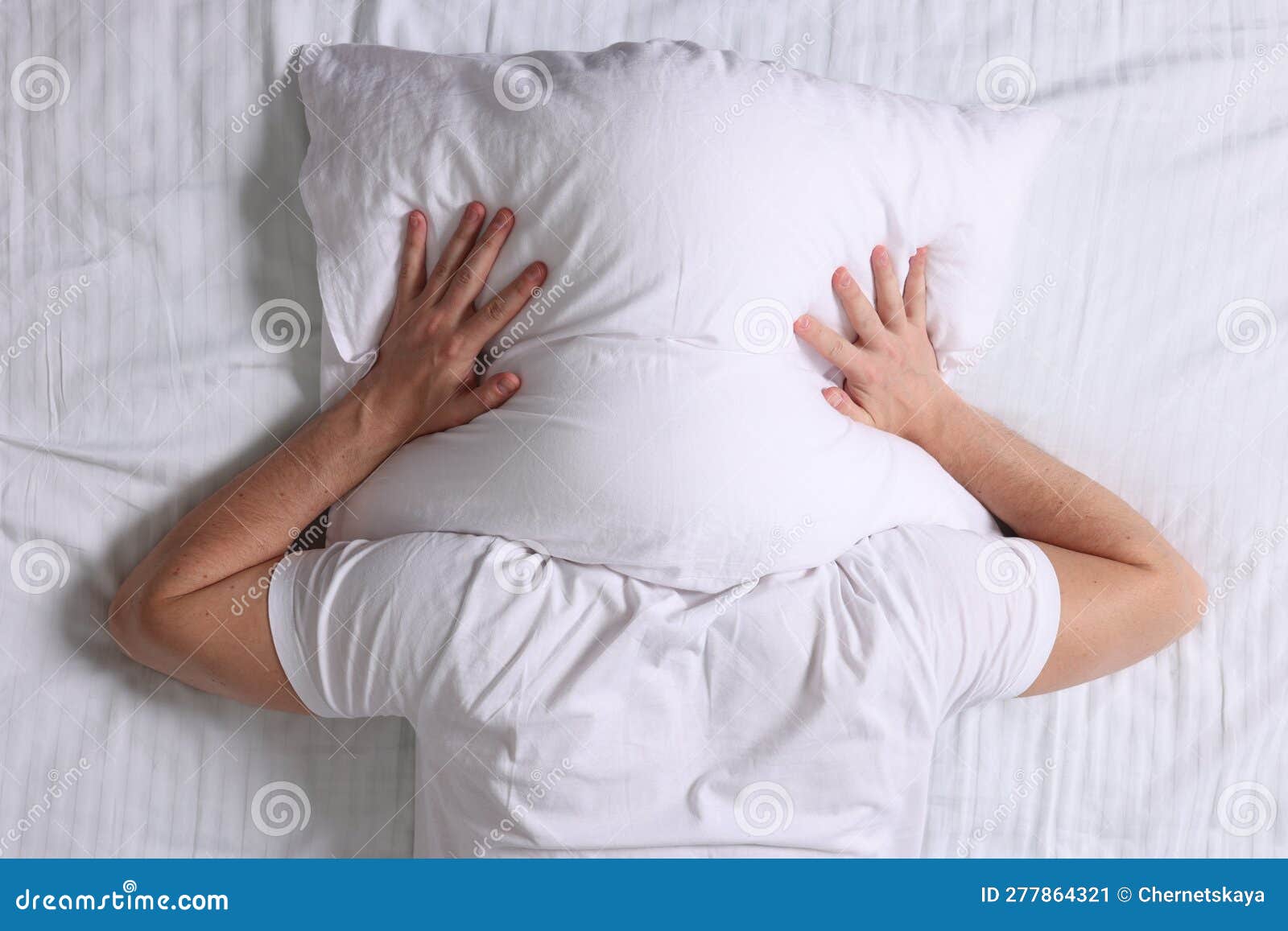 Man Covering His Head with Pillow in Bed, Top View. Insomnia Problem ...