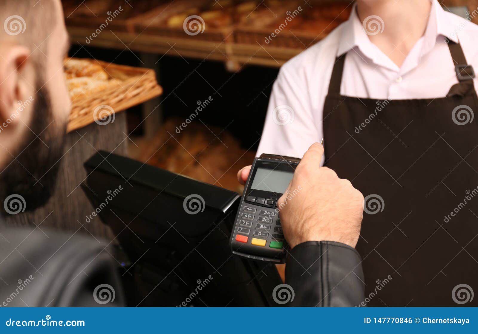 Man with Credit Card Using Payment Terminal at Shop Stock Photo - Image ... Man with Credit Card Using Payment Terminal at Shop Stock Photo - Image ...