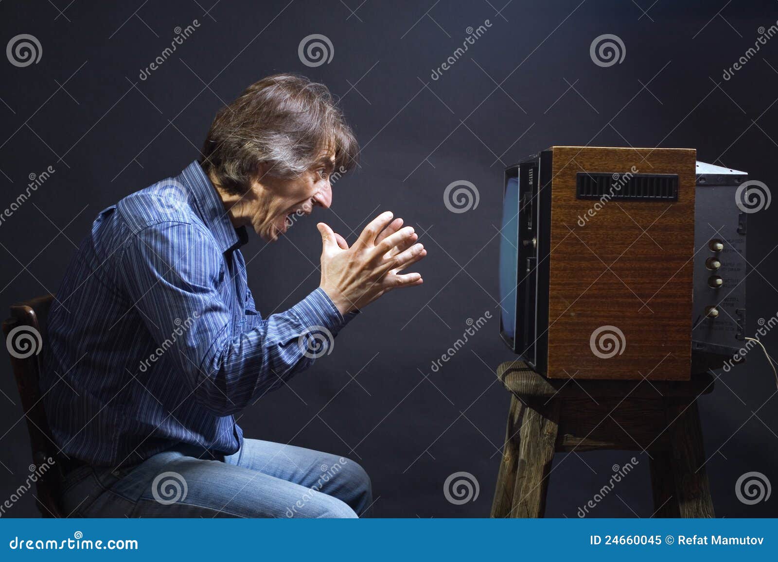 A Man Cries while Watching TV. Stock Image - Image of indoor, leisure ...