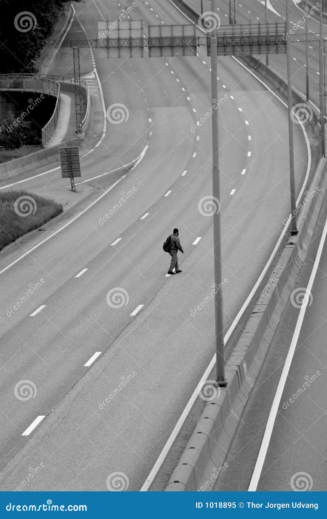 Man crossing the motorway stock image. Image of highway - 1018895