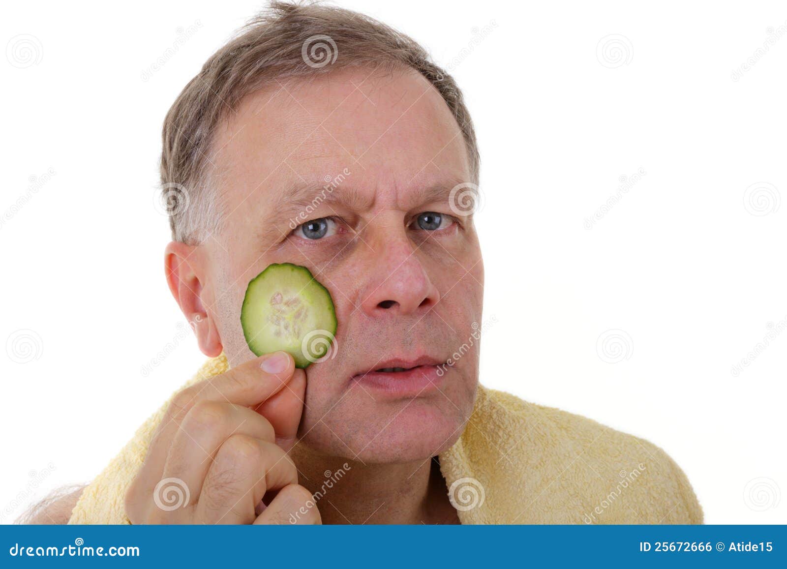 Man with cucumber stock photo. Image of beauty, face - 25672666
