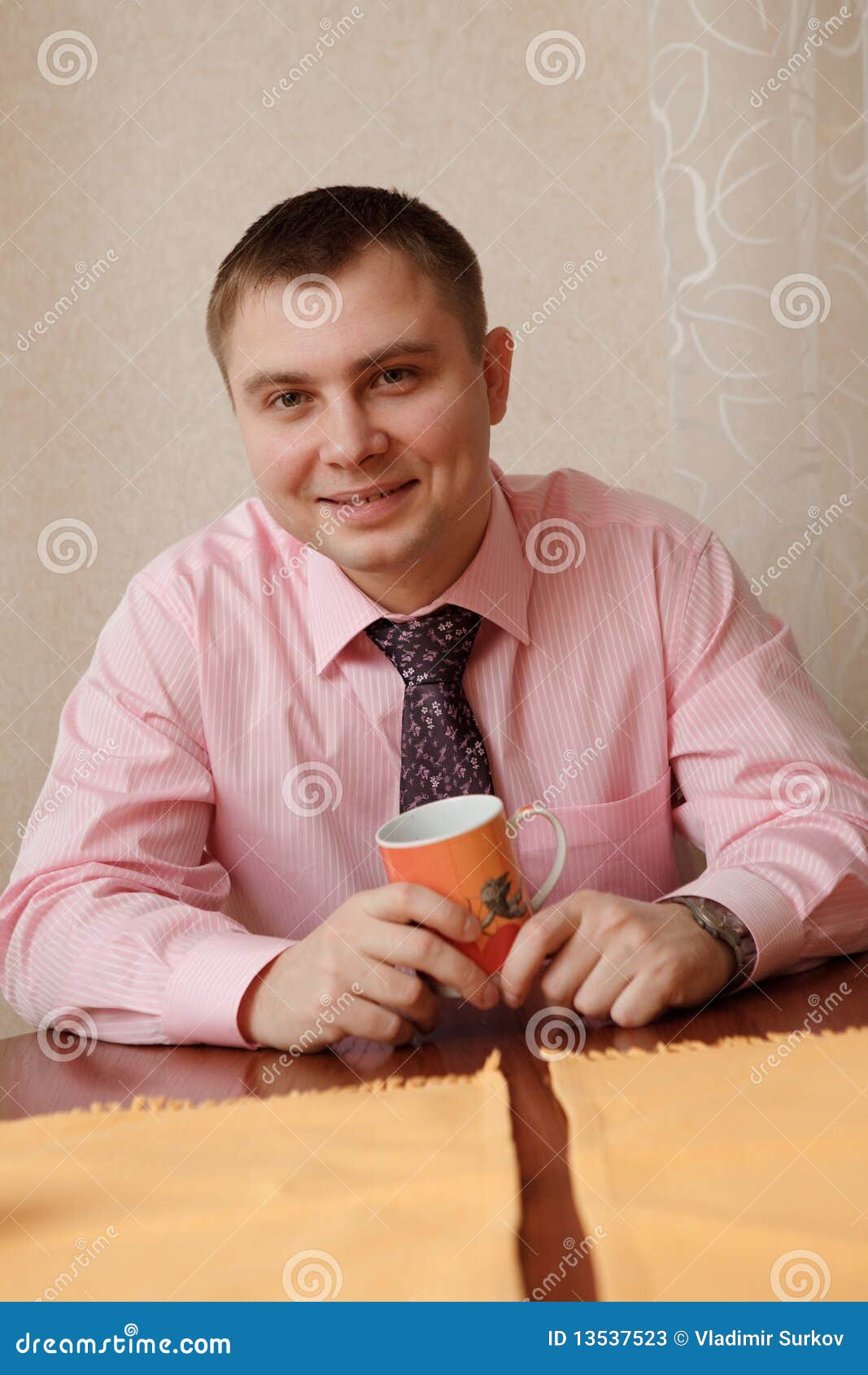 Man with a cup of tea stock image. Image of young, person - 13537523