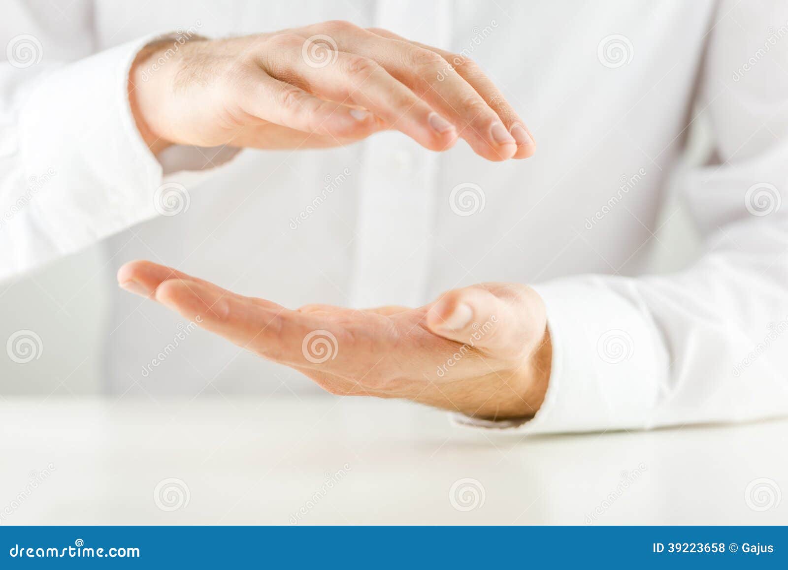 Man Cupping His Hands in a Protective Gesture Stock Photo - Image of ...