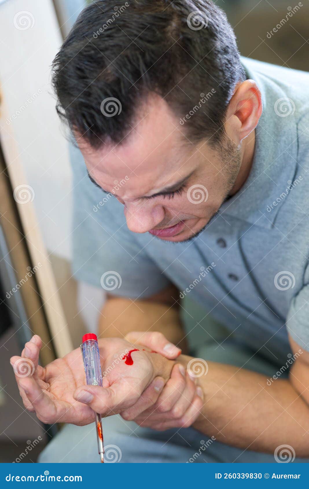 Man with cut on hand stock photo. Image of fear, finger - 260339830