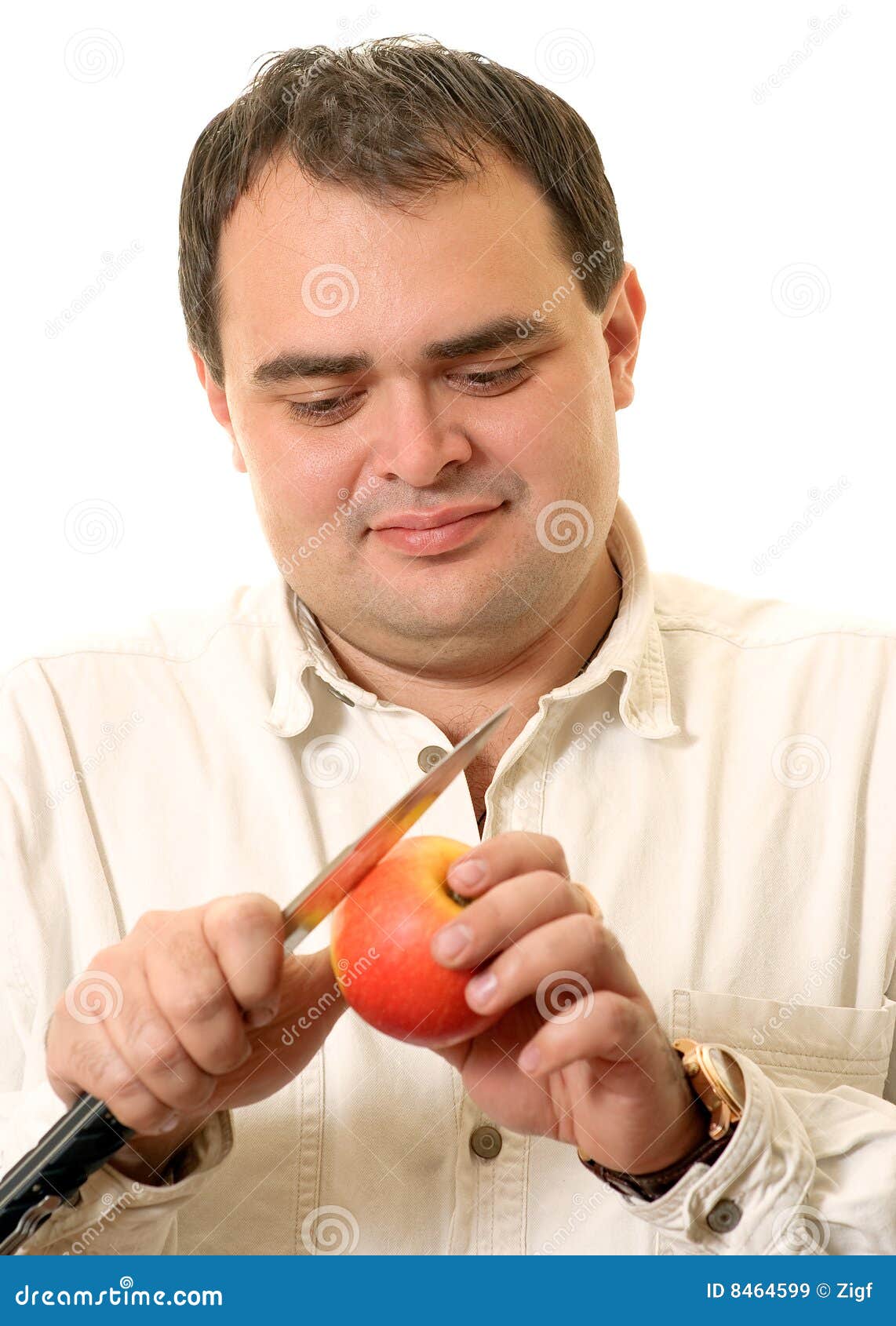 Man cuts an apple stock image. Image of food, knife, person - 8464599