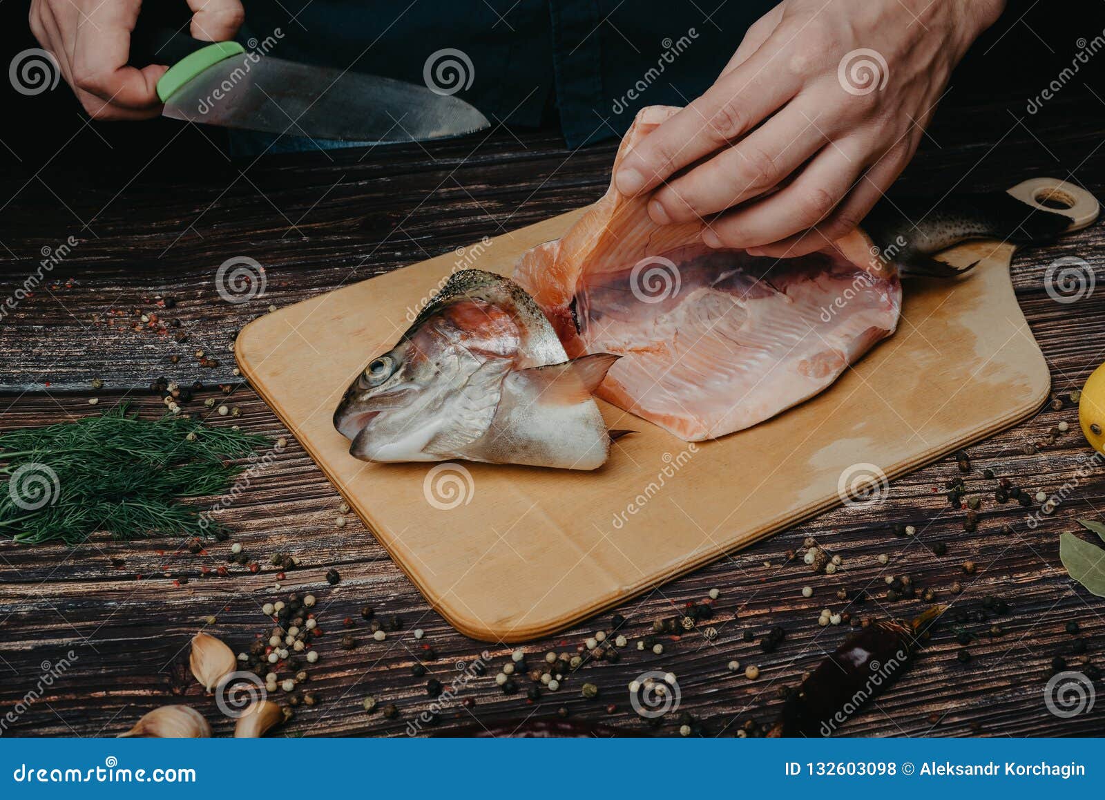 Man Cuts Knife Red Fish on Wooden Board Stock Photo - Image of fillet ...