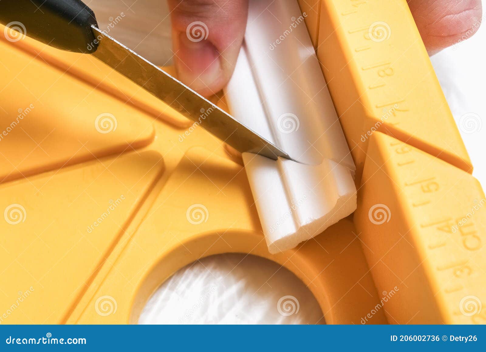 The Man Cuts Off the Molding Cornice on Miter Box. Stock Photo - Image ...
