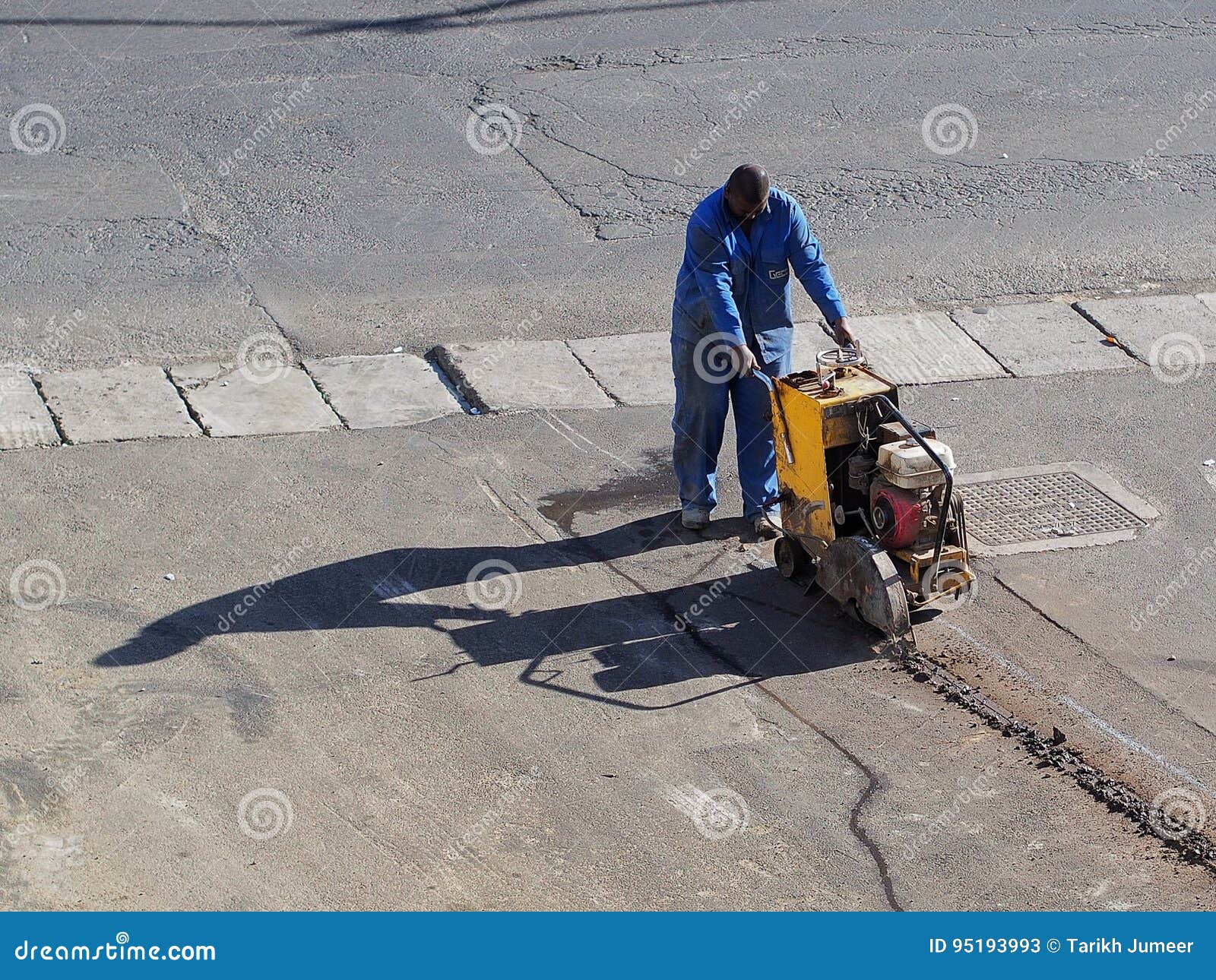 Man Cutting Asphalt with Machine Editorial Stock Photo - Image of ...