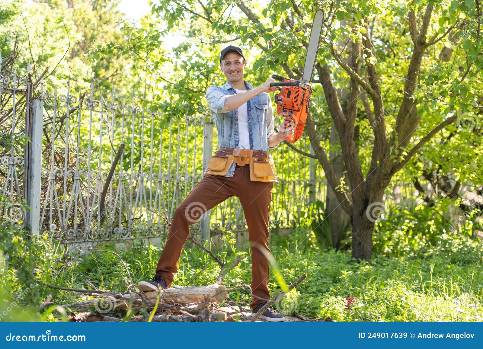 Man Cutting a Branch with Chainsaw Stock Image - Image of manual ...