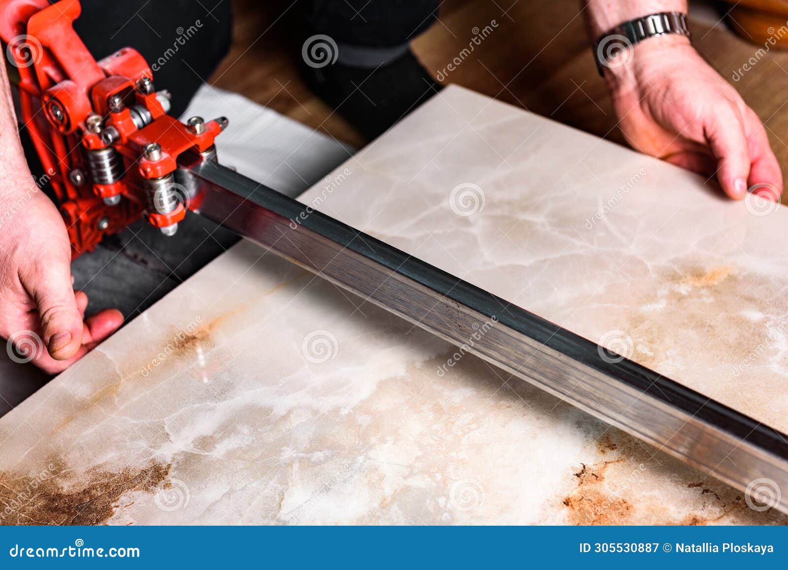 Man Cutting Ceramic Tile with Manual Tile Cutter. Stock Image - Image ...