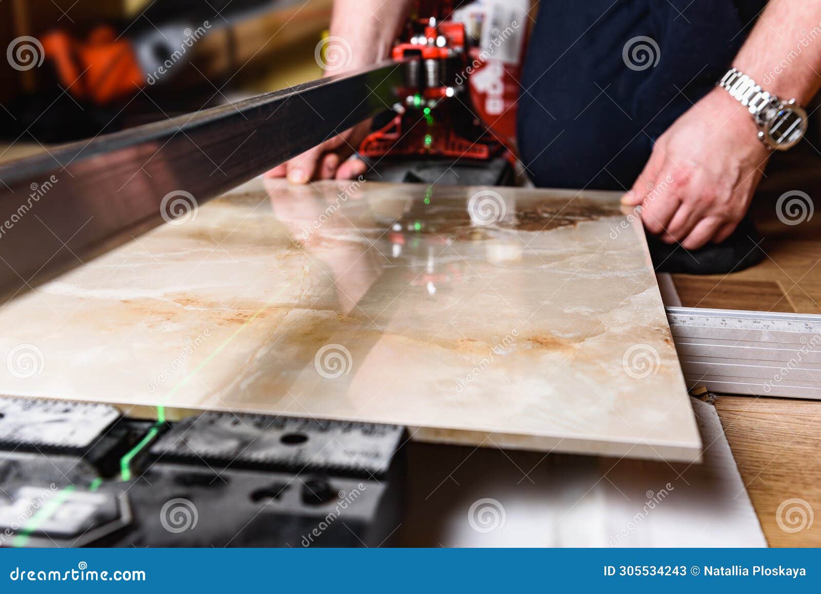 Man Cutting Ceramic Tile with Manual Tile Cutter. Stock Image - Image ...