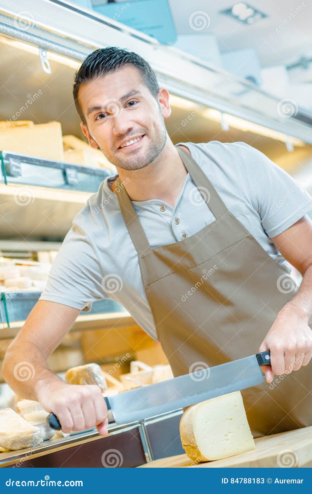 Man Cutting Cheese for Customer Stock Image - Image of product, dairy ...