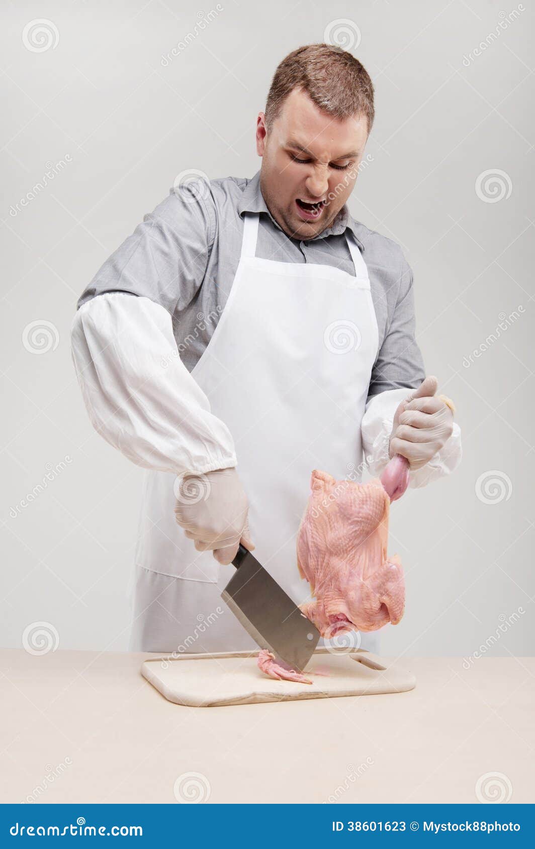 Man Cutting Chicken Wing and Watching. Stock Image - Image of chicken ...