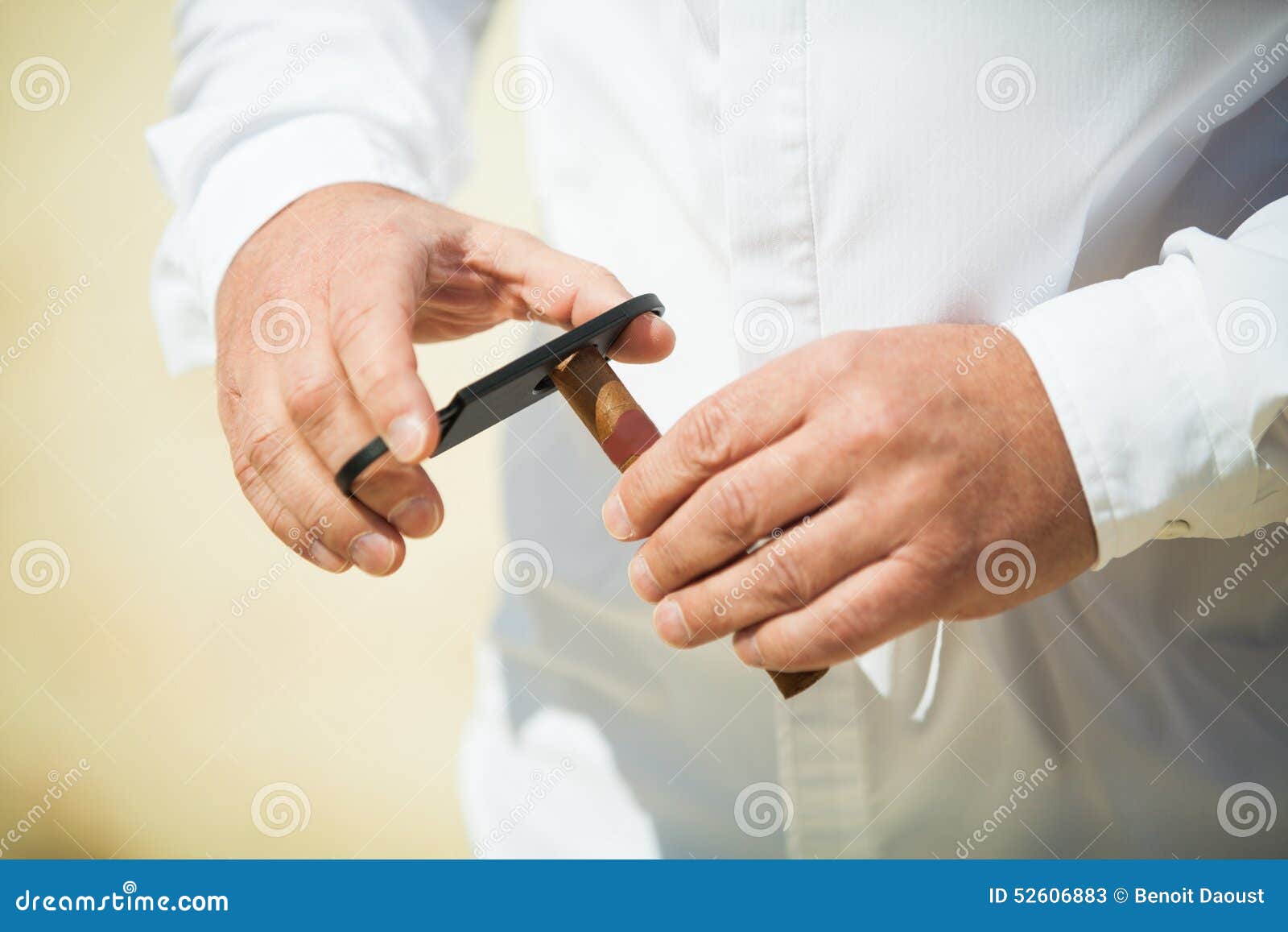 Man Cutting a Cigar stock image. Image of smoking, product - 52606883