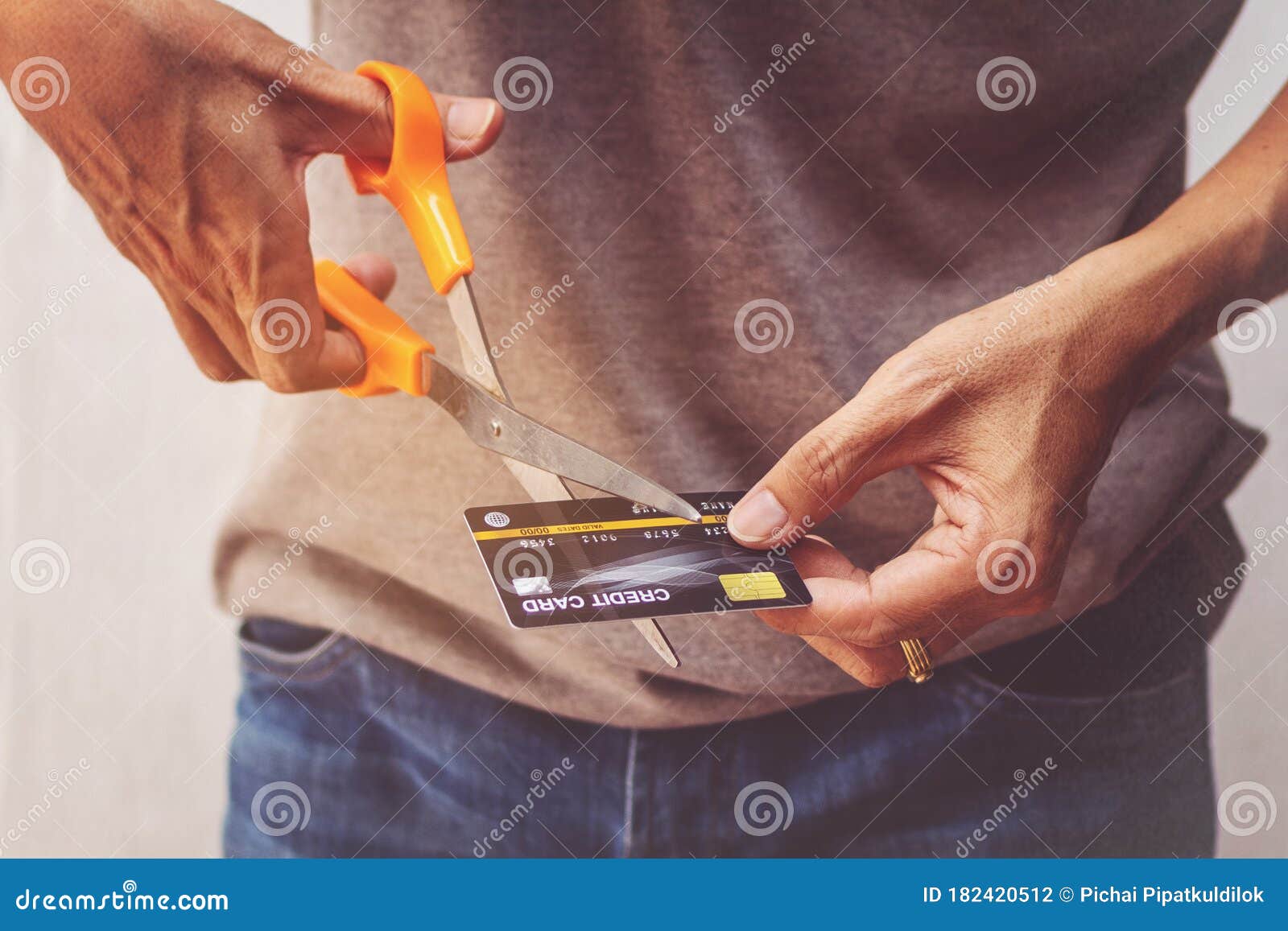 Man Cutting Credit Card with Scissors Stock Photo - Image of credit ...