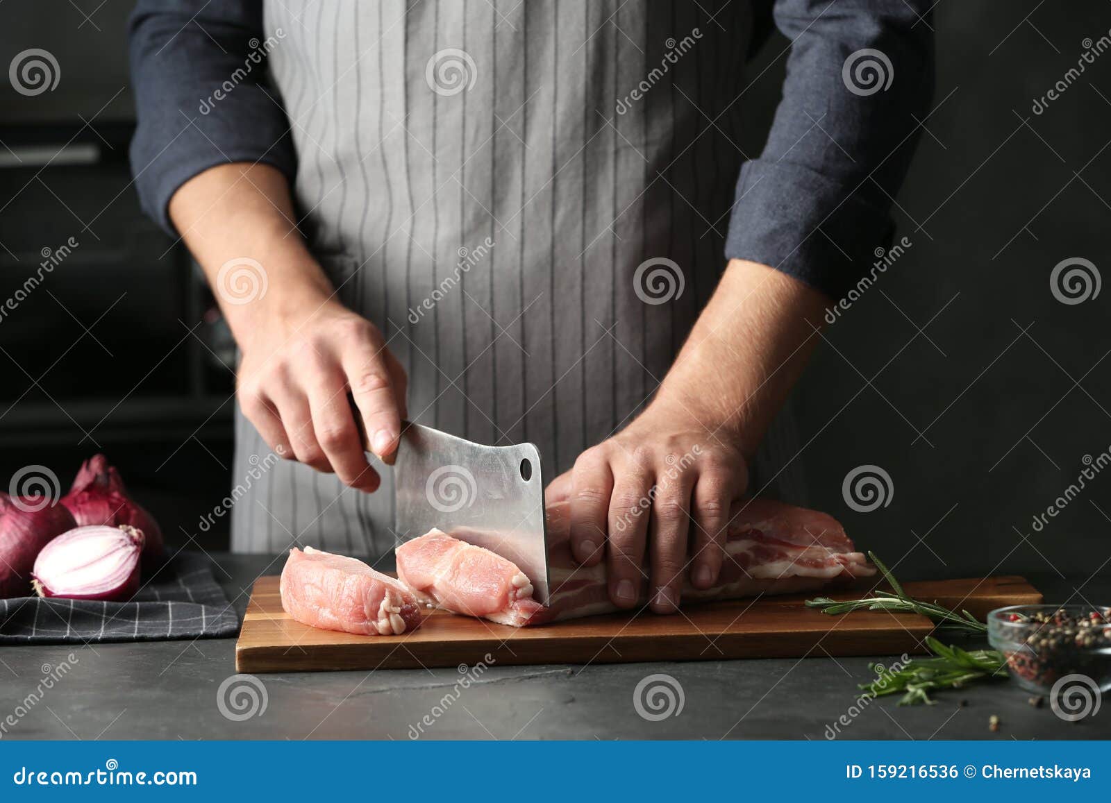 Man Cutting Fresh Raw Meat on Grey Table Stock Photo - Image of market ...