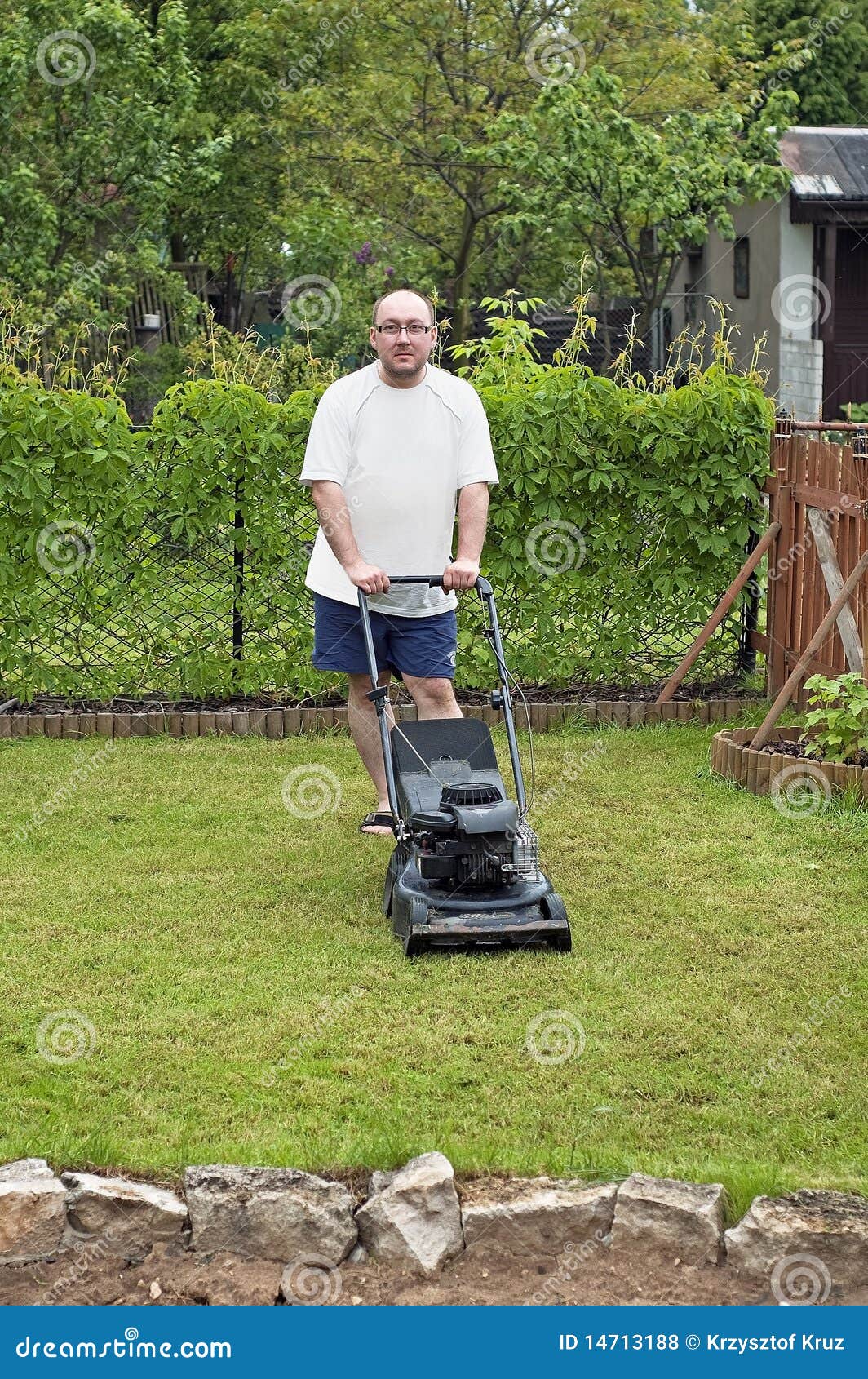 Man Cutting Grass at Suburban House Stock Photo - Image of mowing ...