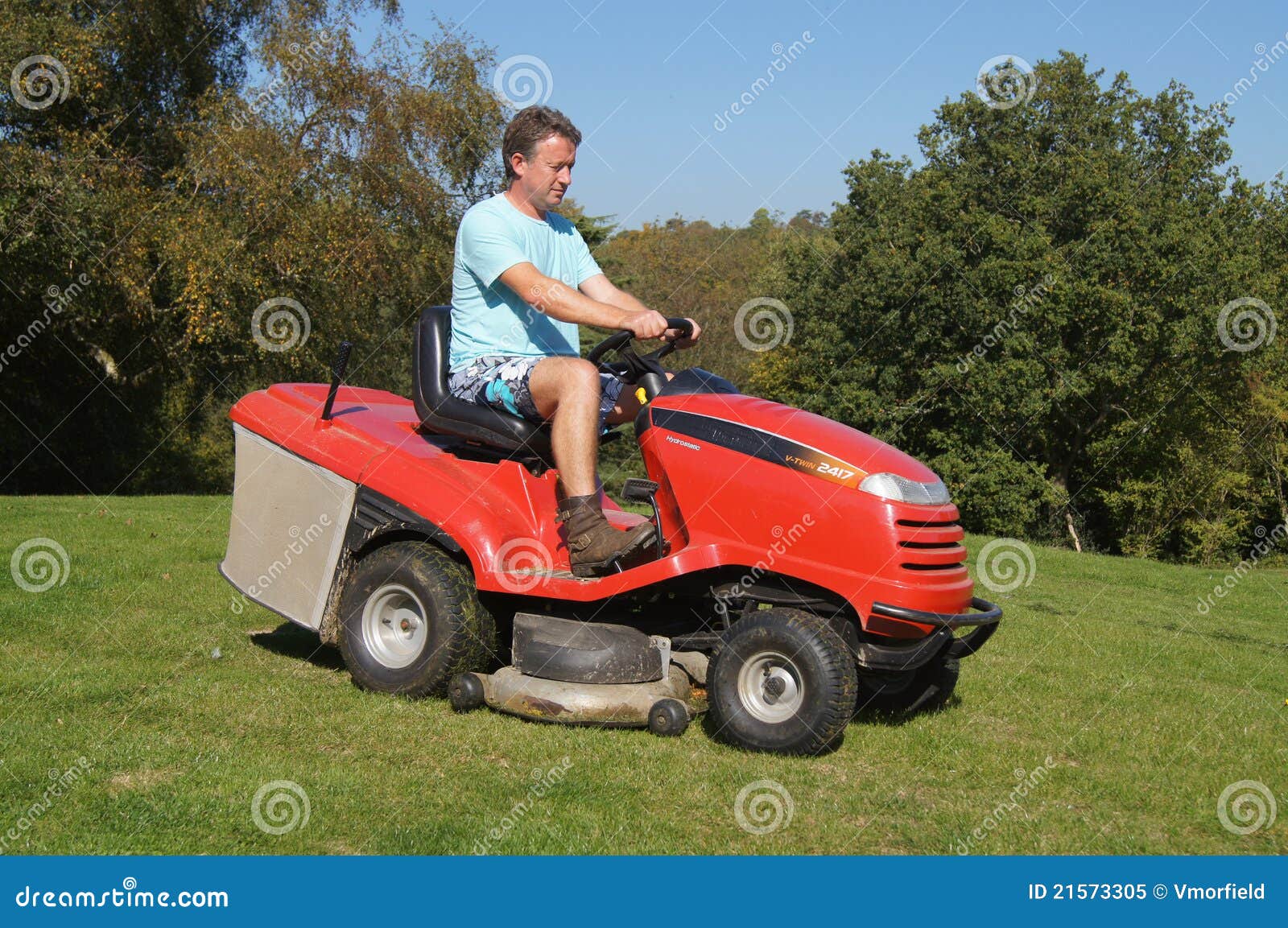 Man cutting his grass stock image. Image of field, gardener - 21573305