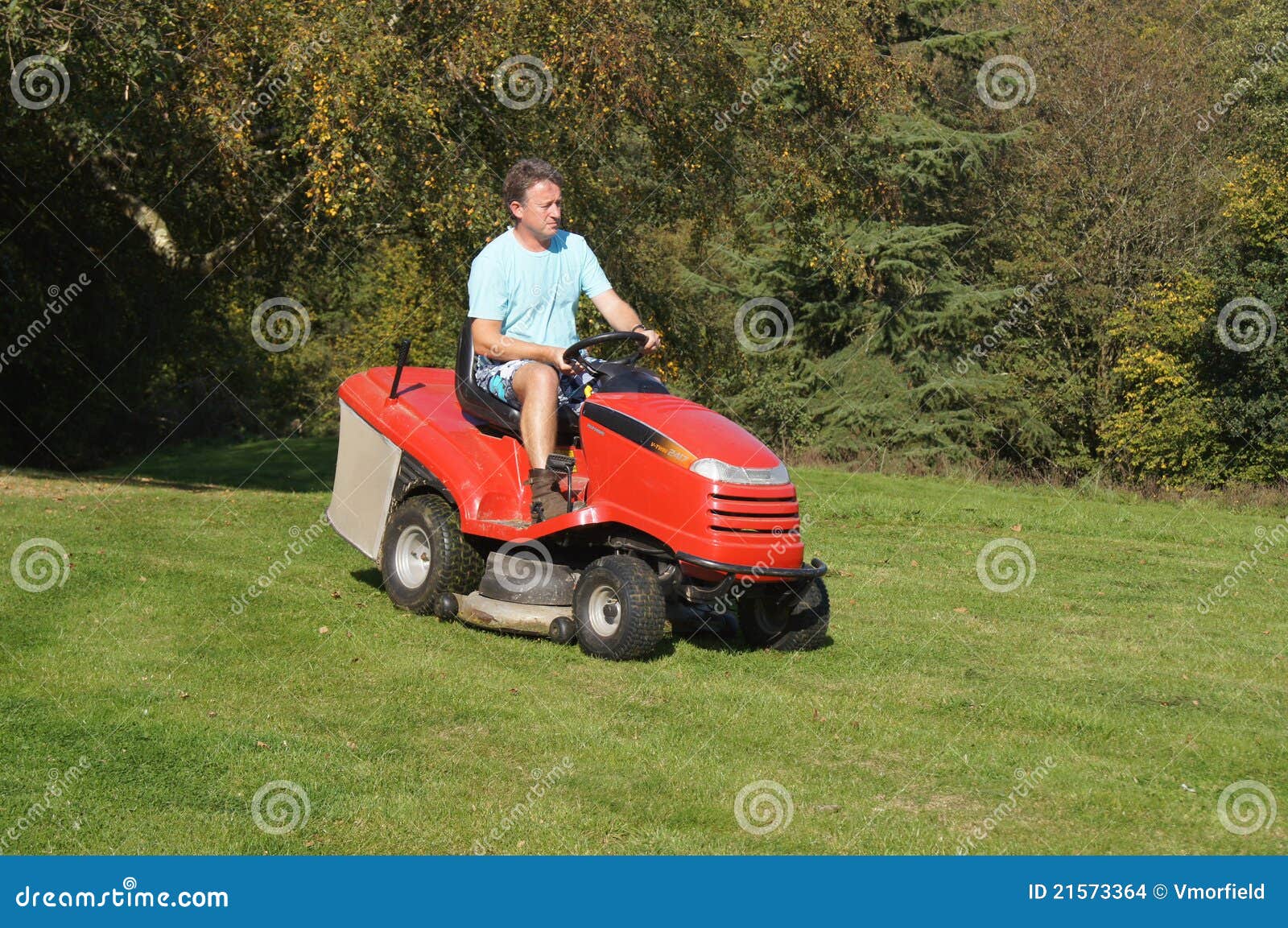 Man cutting his grass stock photo. Image of mowing, lawn - 21573364