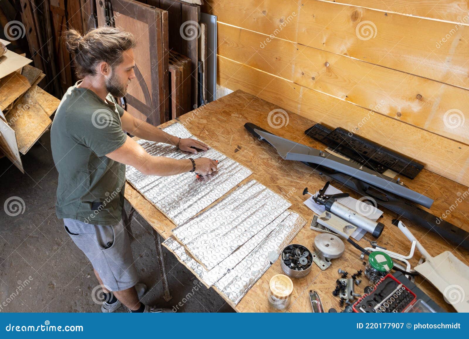 Man Cutting with a Knife on a Workbench Stock Image - Image of utility ...