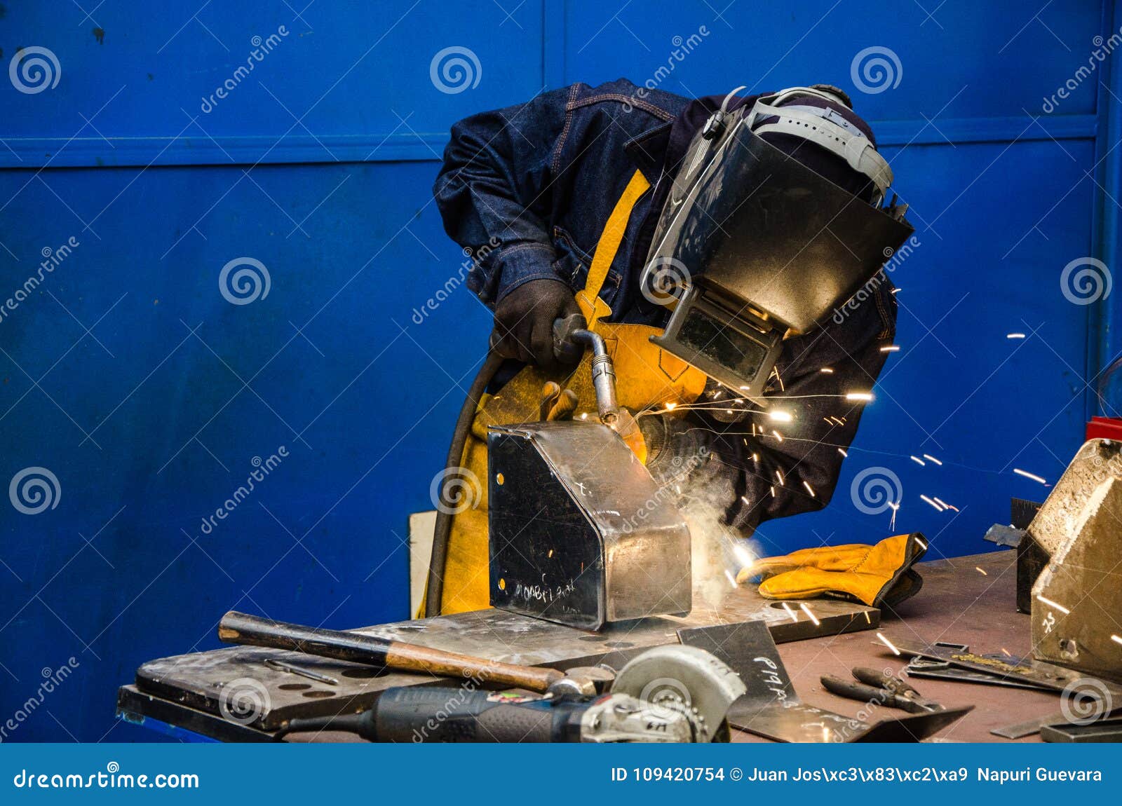 Man cutting iron stock photo. Image of rotation, technology - 109420754