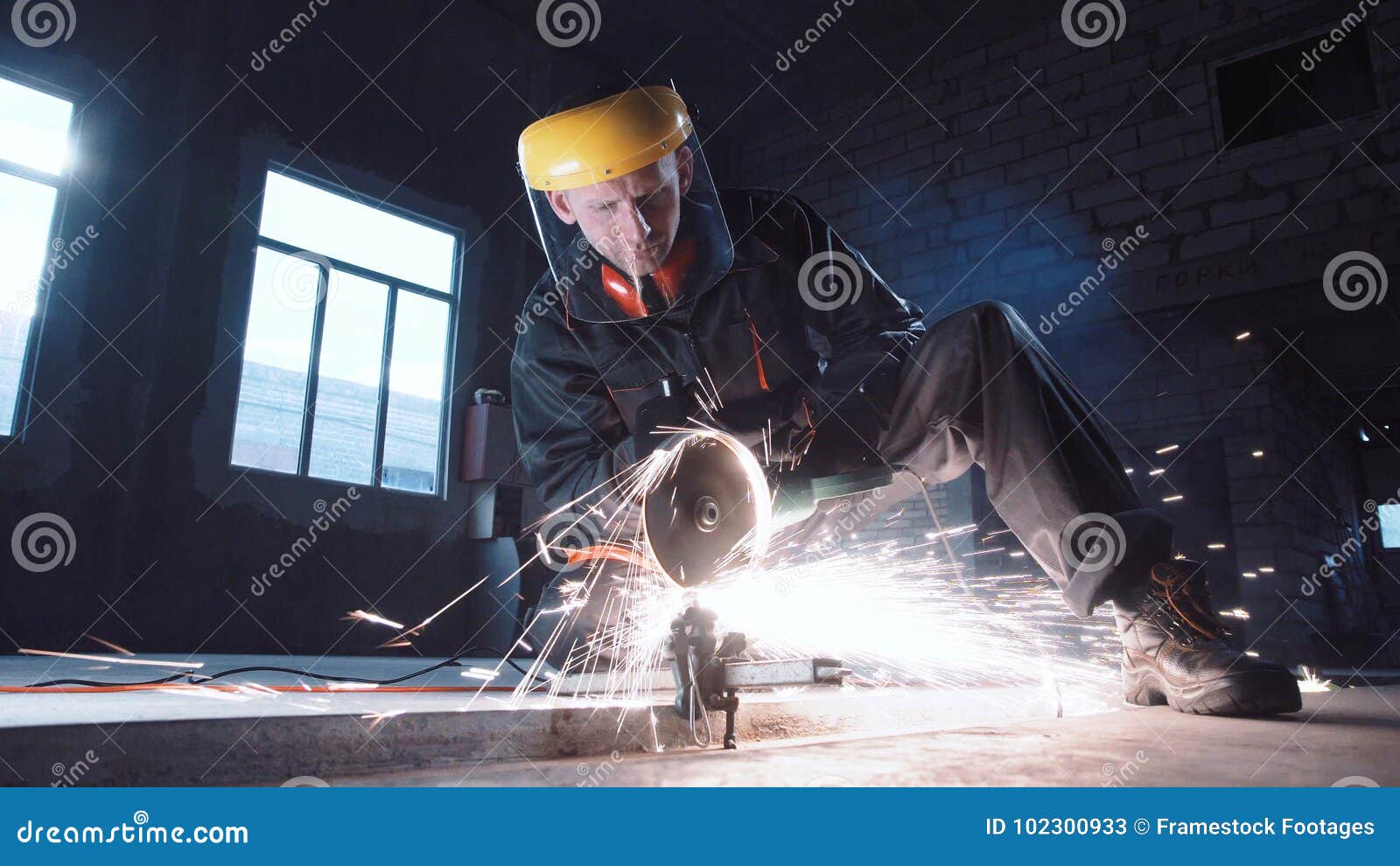 Man Cutting Metal Using Grinding Machine Stock Image - Image of hangar ...