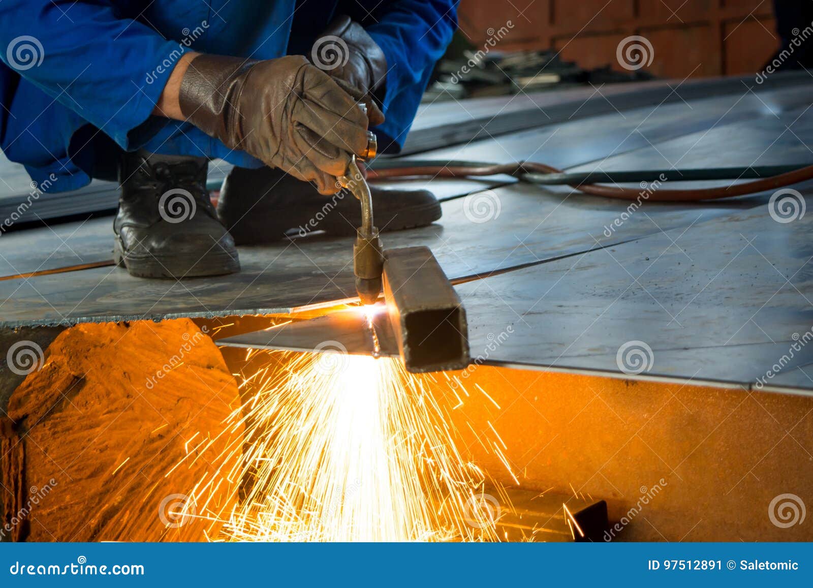 Man Cutting Metal with a Welding Cutting Torch Stock Image - Image of ...