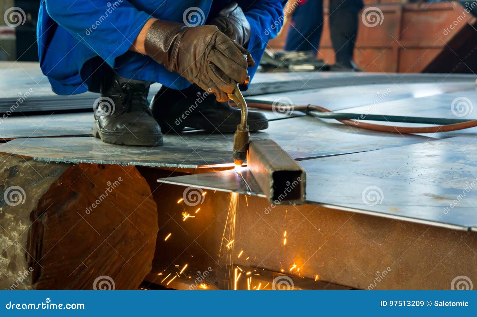 Man Cutting Metal with a Welding Cutting Torch Stock Image - Image of ...