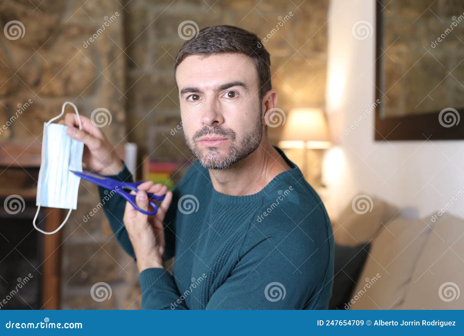 Man Cutting Protective Surgical Mask with Scissors Stock Image - Image ...