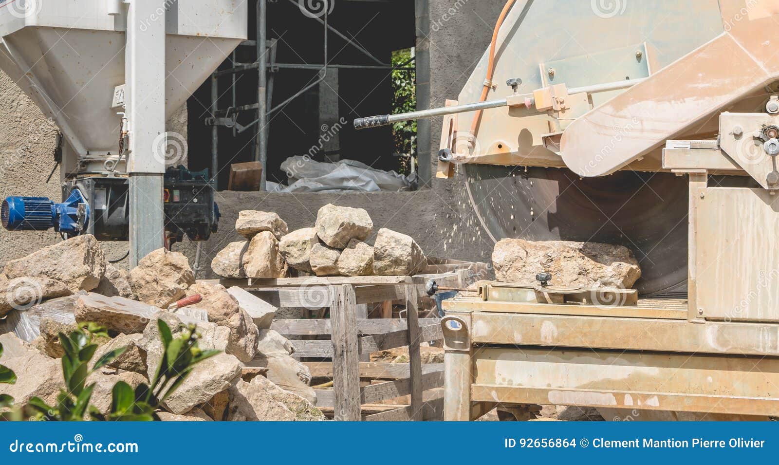 Man Cutting a Stone with a Water Saw Stock Photo - Image of rock ...