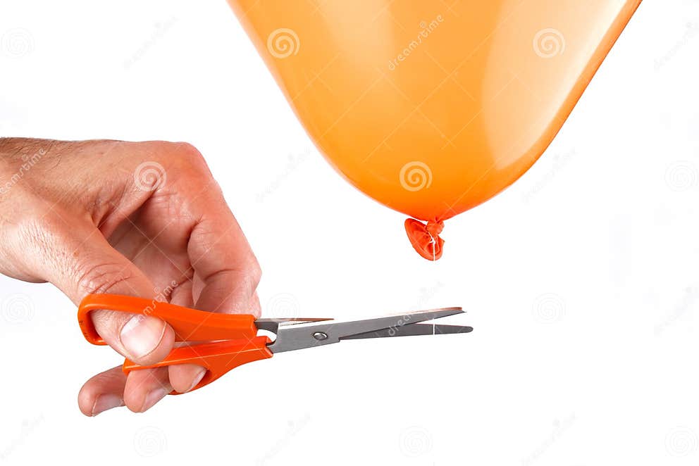 Man Cutting the String of a Balloon with Scissors Stock Photo - Image ...