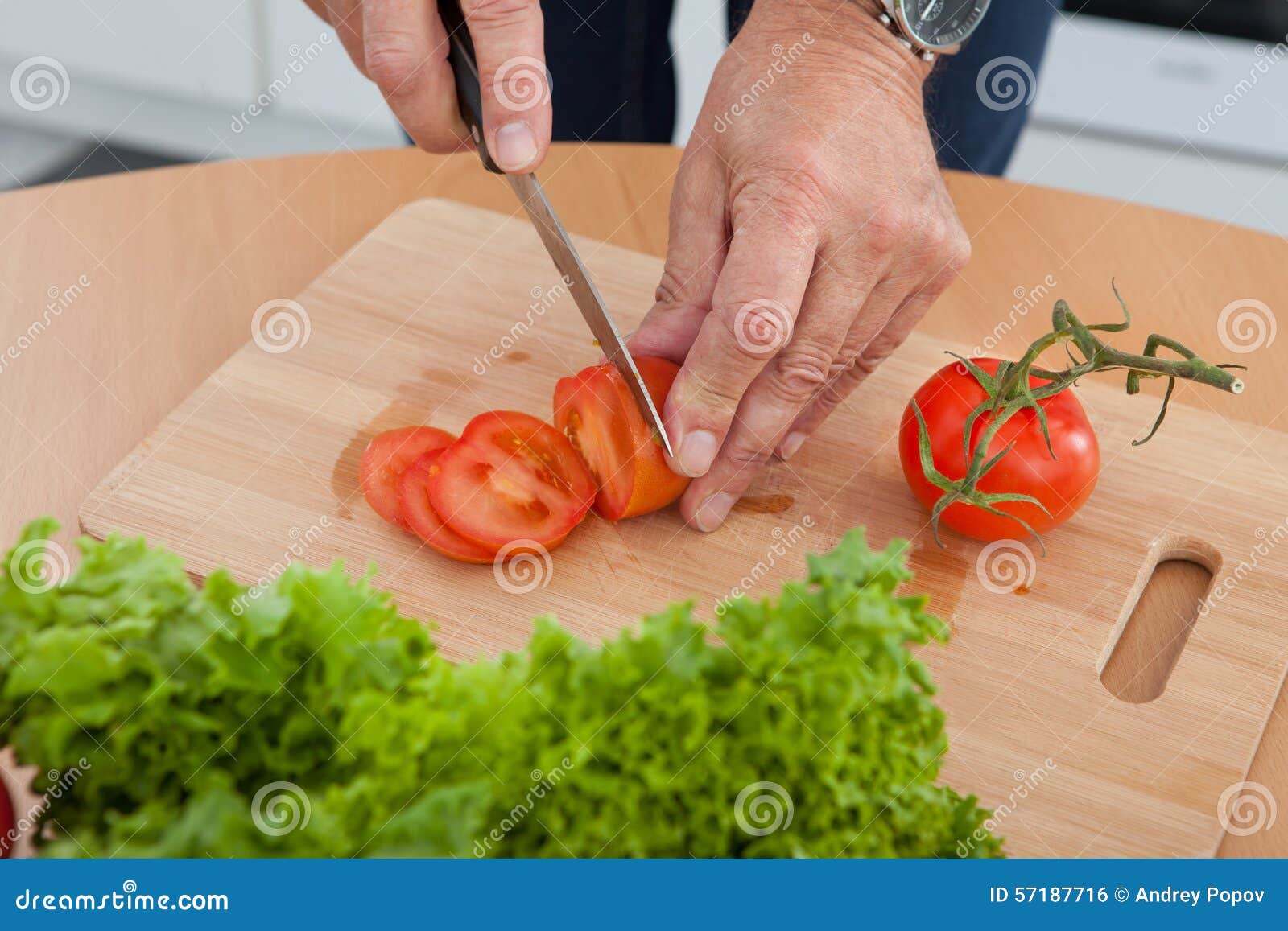 Man Cutting Vegetables stock photo. Image of assistance - 57187716