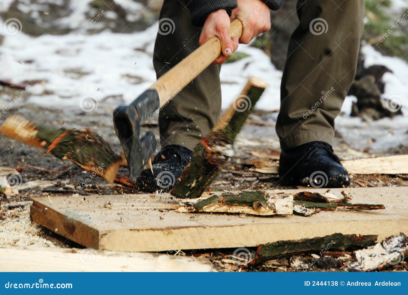 Man cutting wood stock photo. Image of work, woodsman - 2444138