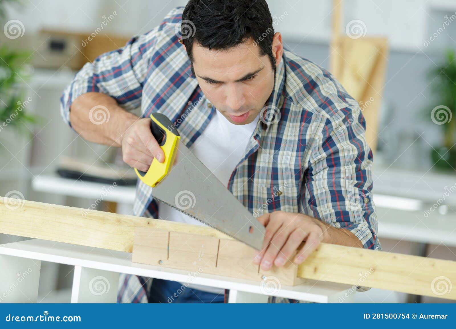 Man cutting wood stock photo. Image of masonry, builder - 281500754