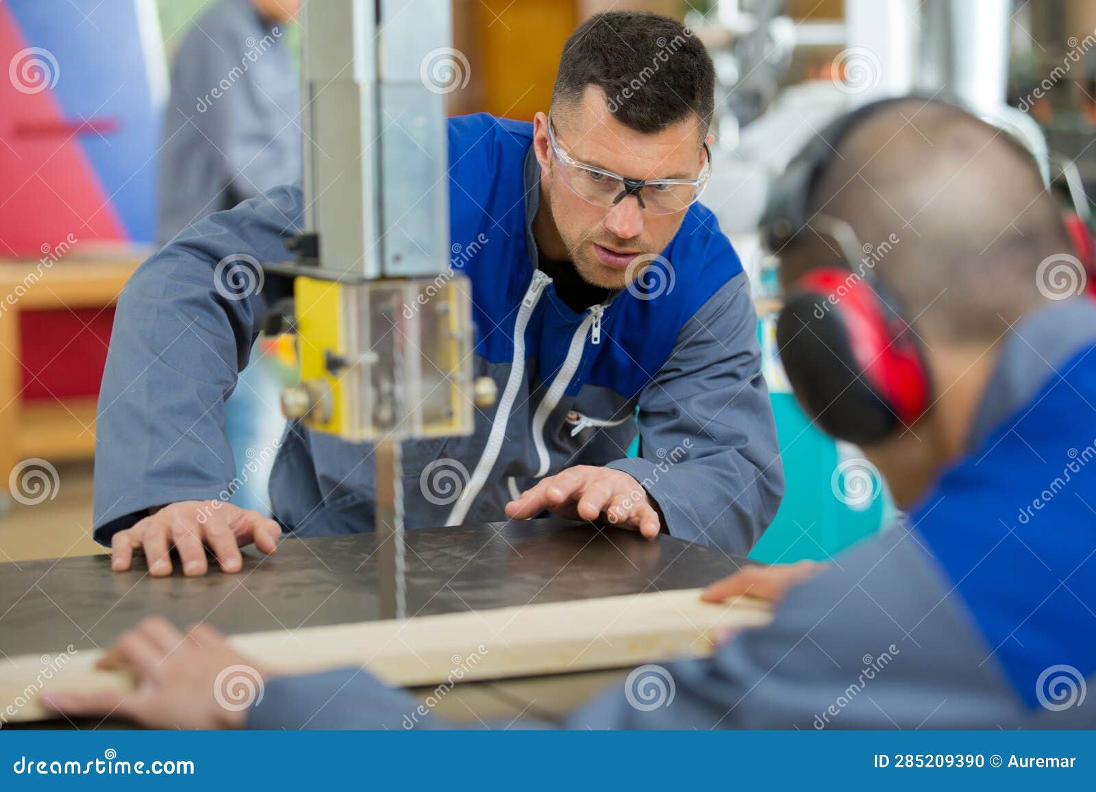 Man Cutting Wood with Band Saw Stock Photo - Image of power, hammer ...