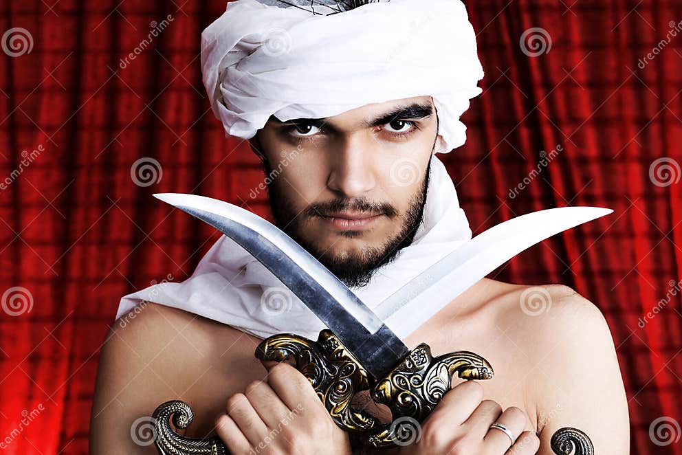 Man with daggers stock photo. Image of brave, person - 14388024