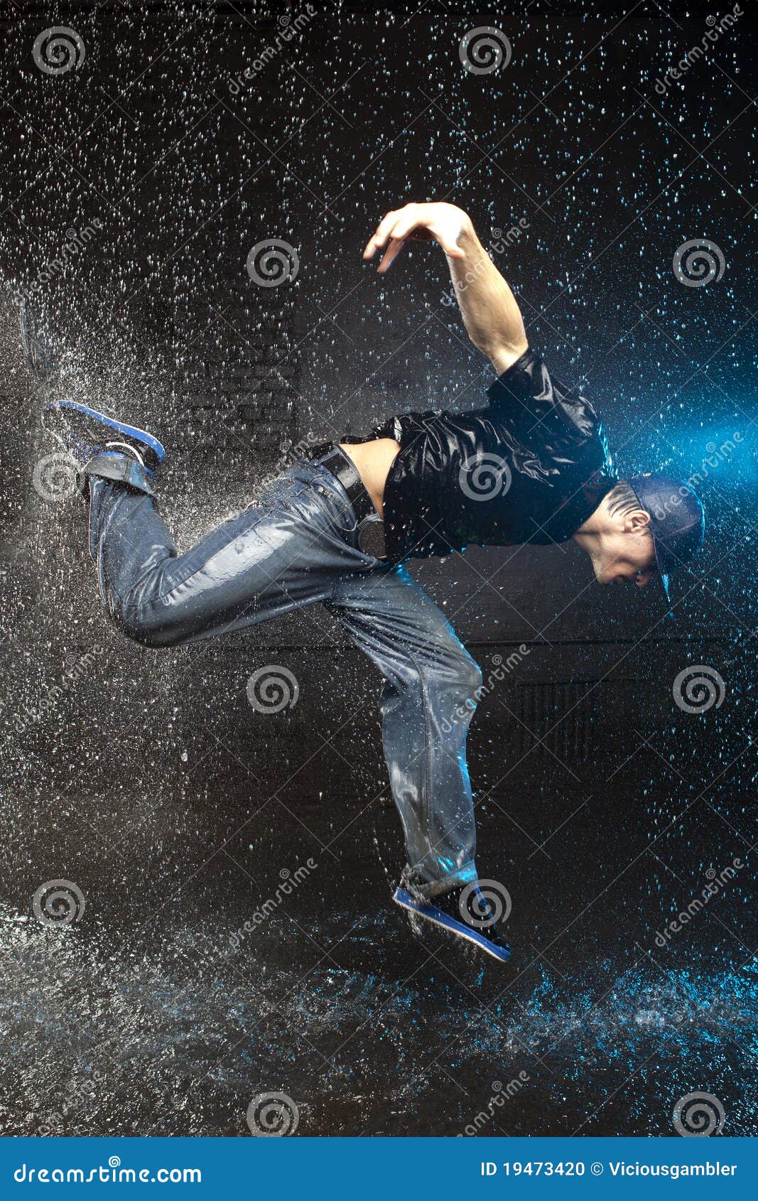 Man dancing in the rain stock photo. Image of soak, young - 19473420