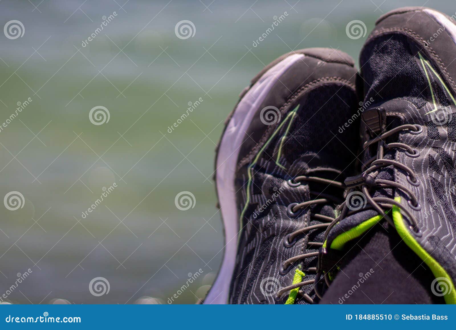 Man Dangling Feet Over Water Stock Photo - Image of lifestyle, male ...