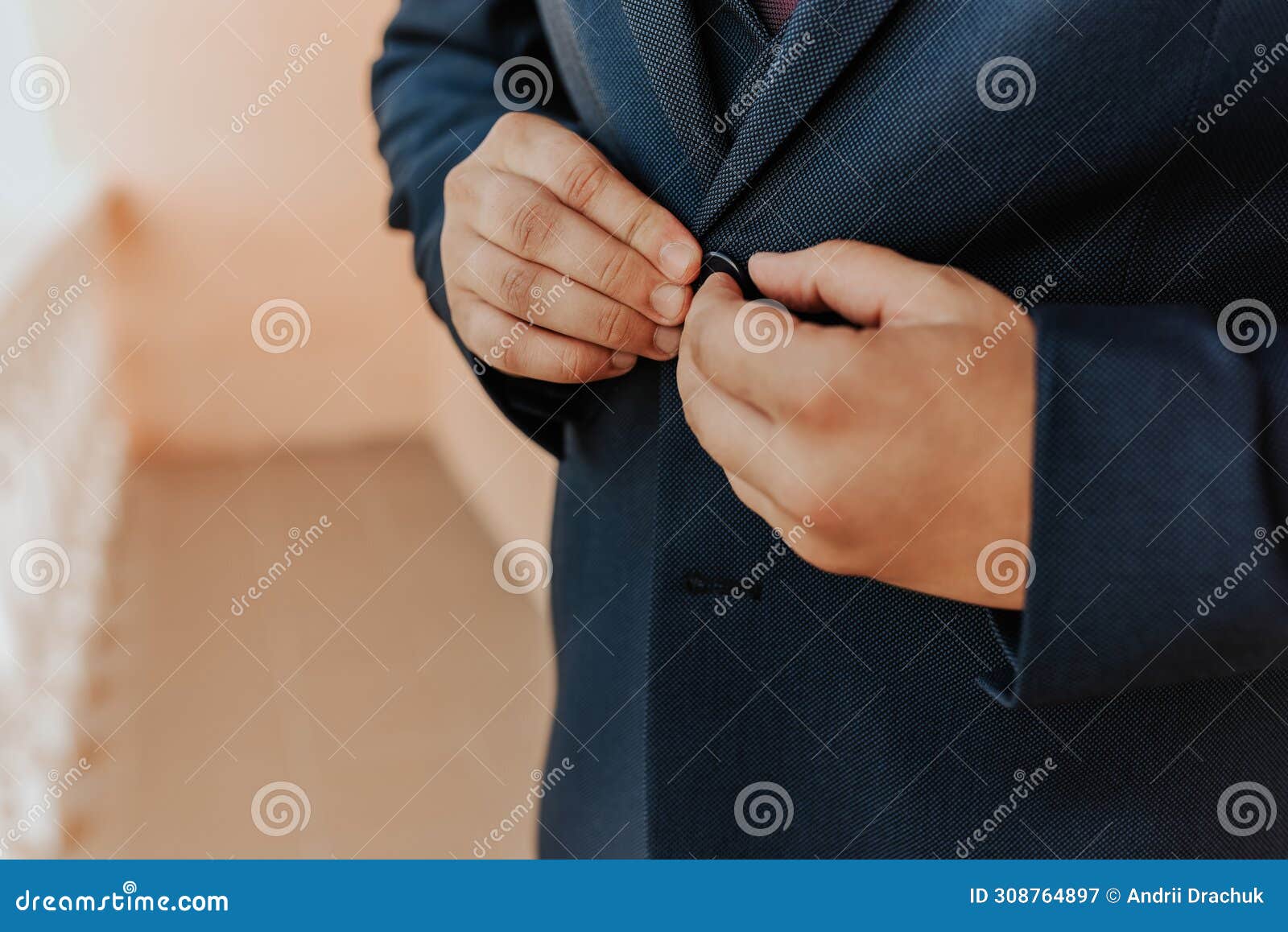 A Man in a Dark Business Suit Buttoning a Button on His Jacket. Stock ...