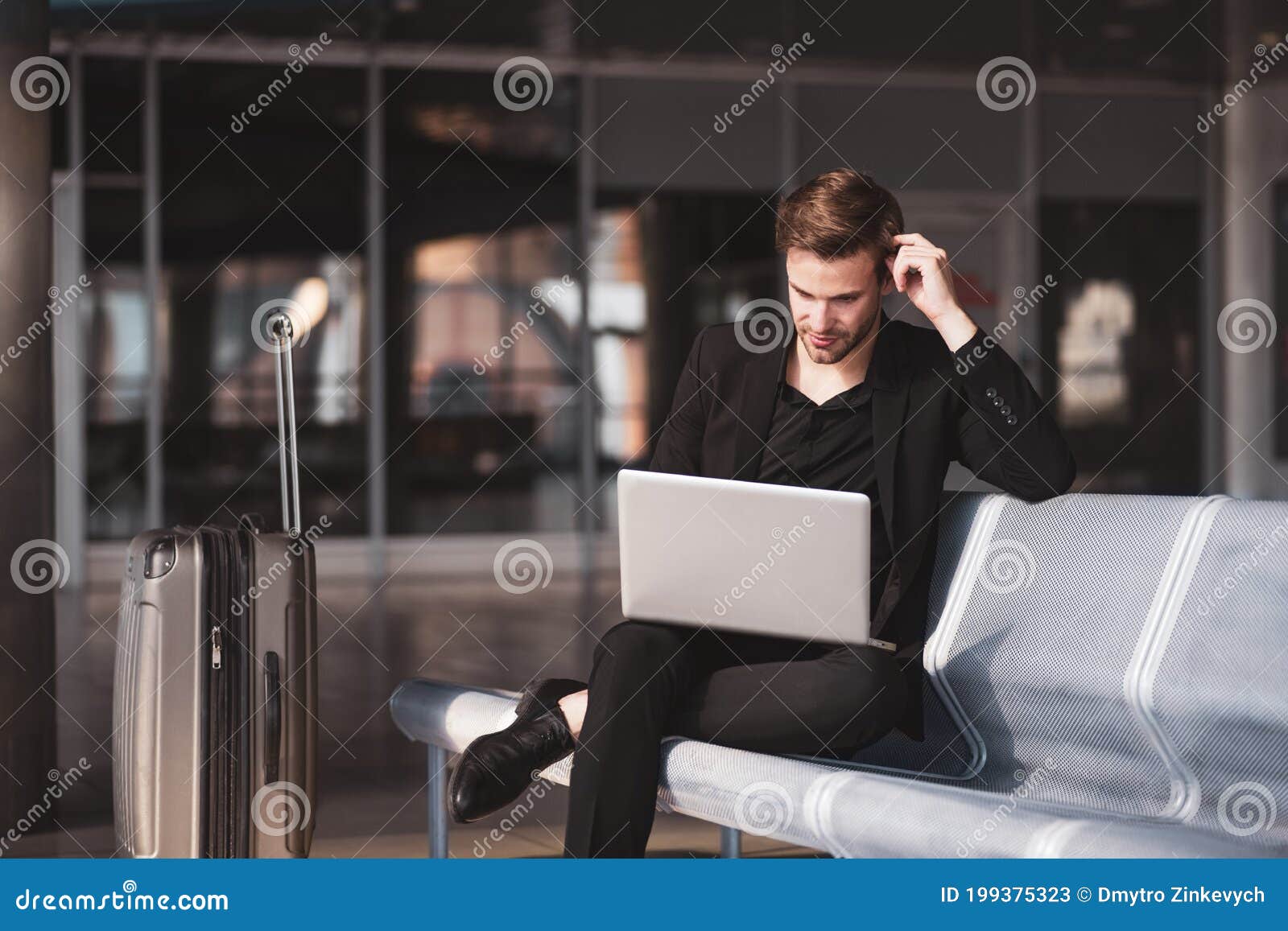 Man Dealing with His Task while Waiting for the Boarding Stock Image ...