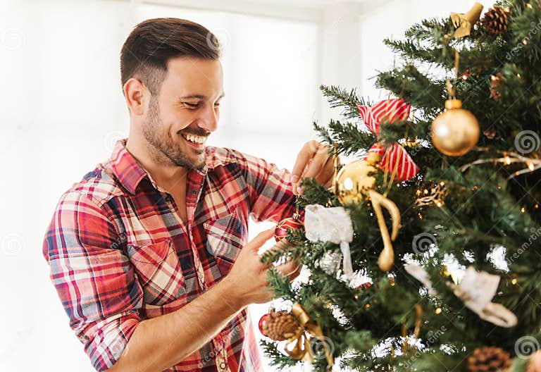 Man Decorating a Christmas Tree Stock Photo - Image of person, pine ...