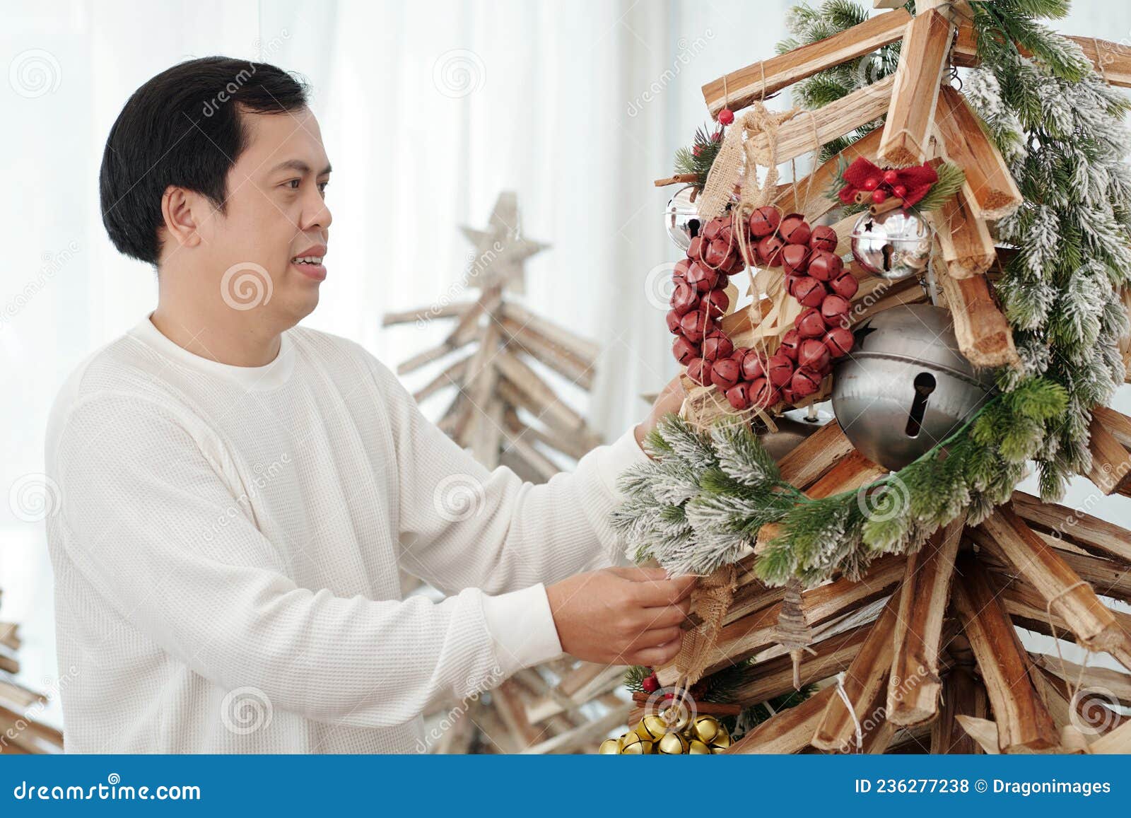 Man Decorating Christmas Tree Stock Photo - Image of craft ...