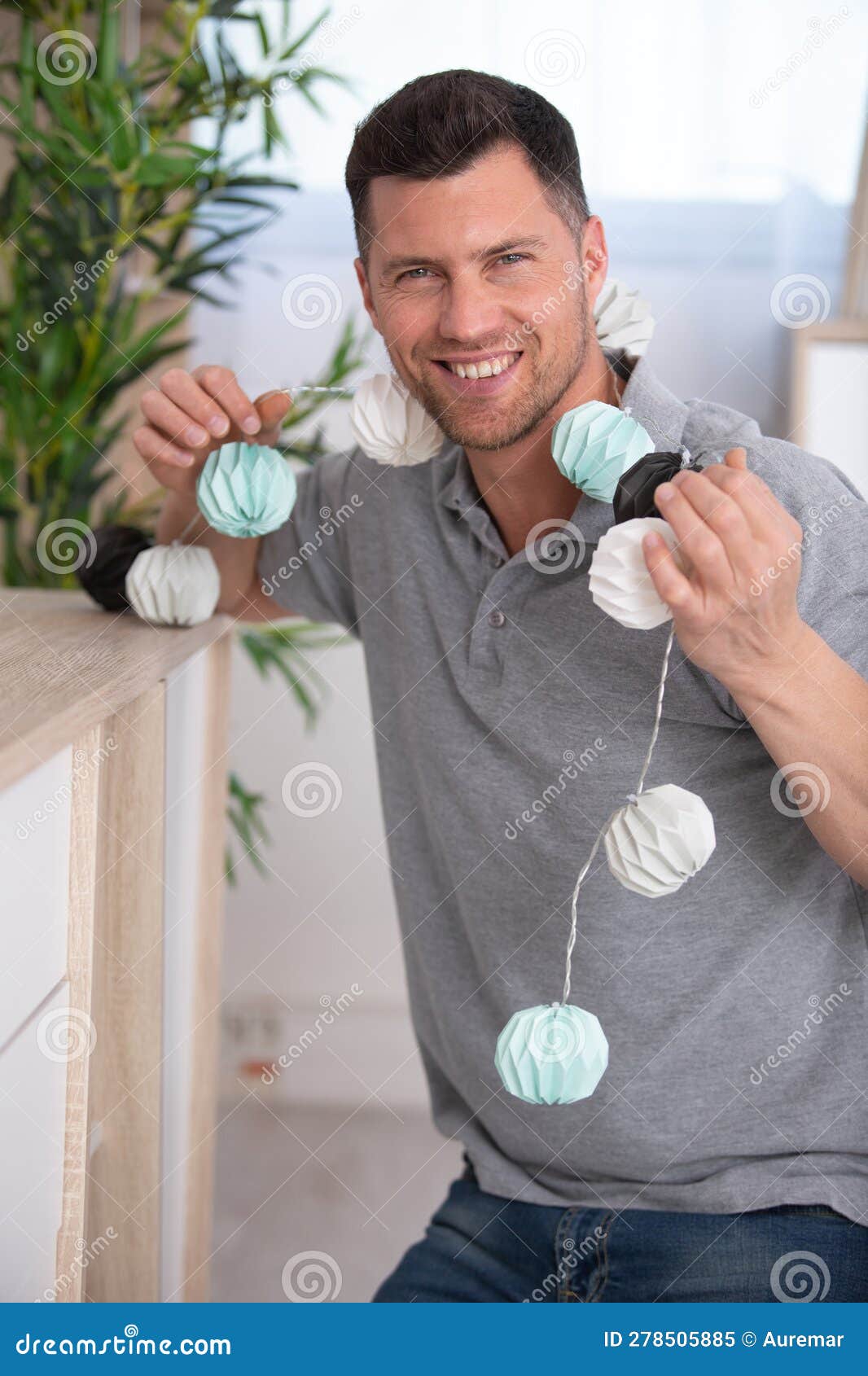 Man Decorating House with Lights Stock Image - Image of event ...