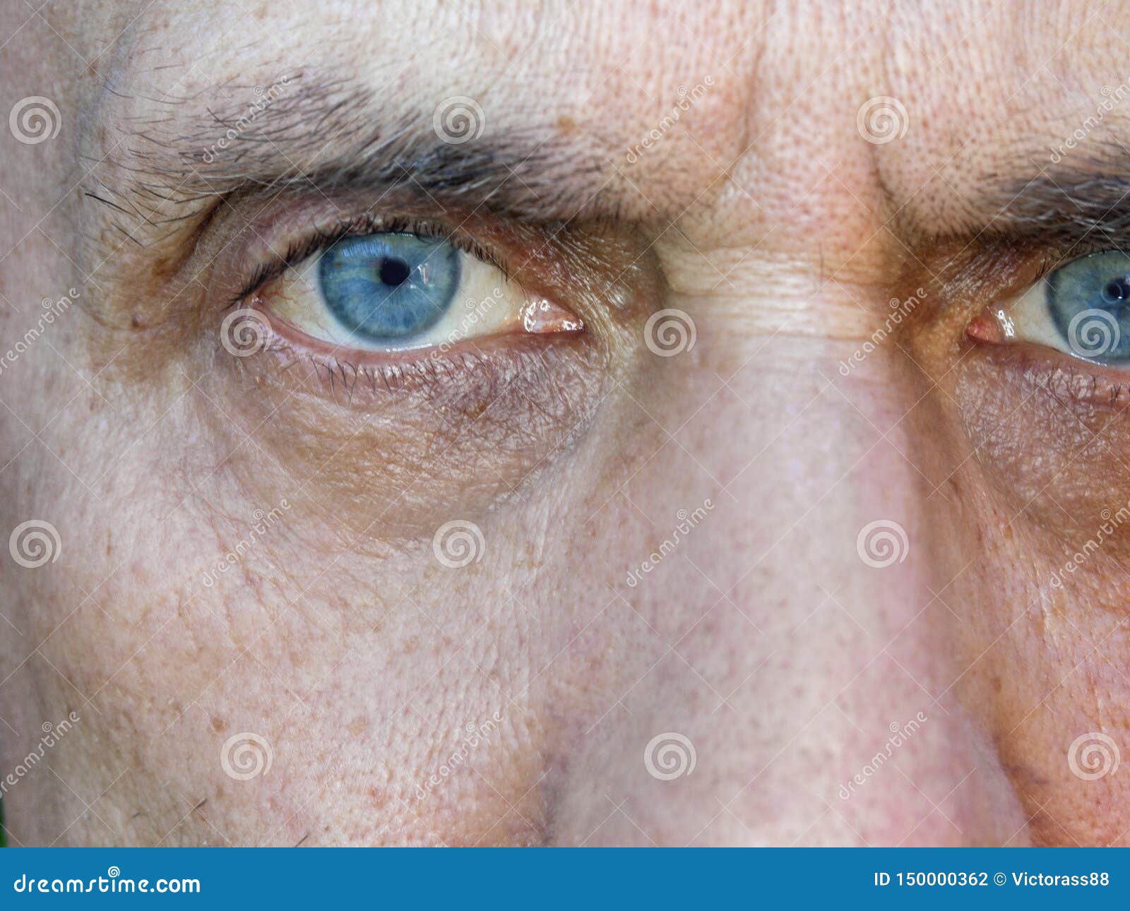 Man with deep blue eyes stock photo. Image of lifestyle - 150000362