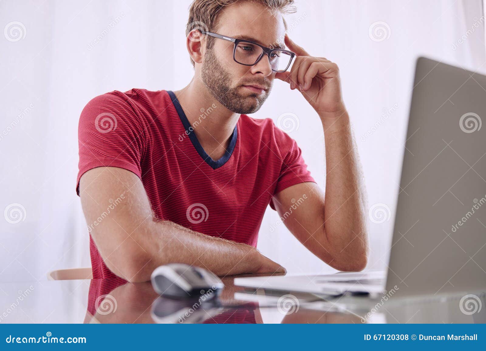 Man Deep in Concentration Infront of Computer Stock Photo - Image of ...