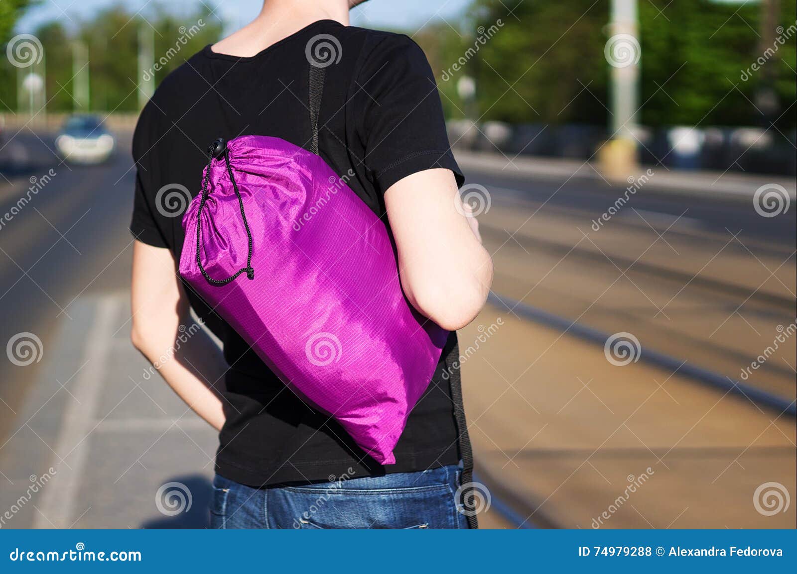 Man with Deflated Inflatable Sofa on the Road Stock Photo - Image of ...