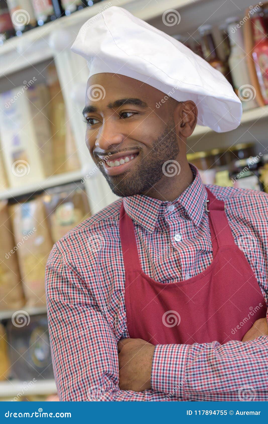 Man at Deli Counter Wearing Apron and Hat Stock Image - Image of staff ...